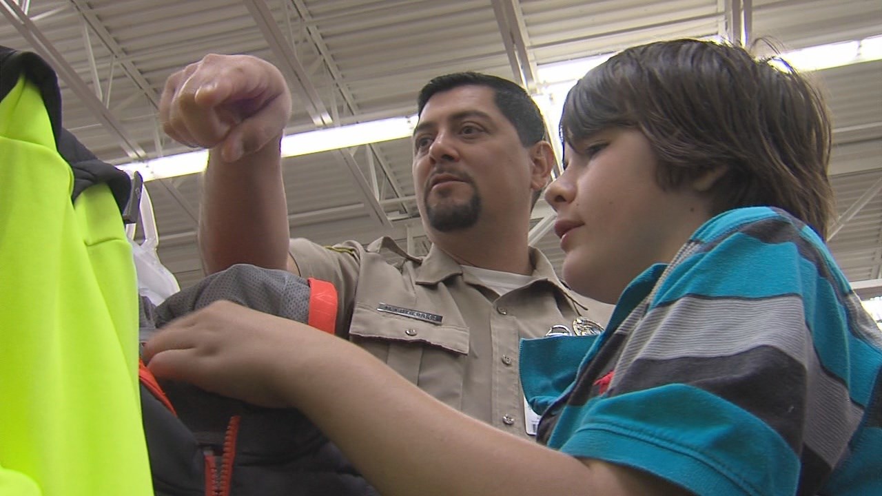 Various Law Enforcement Help Kids During "Shop With A Cop" Event ...